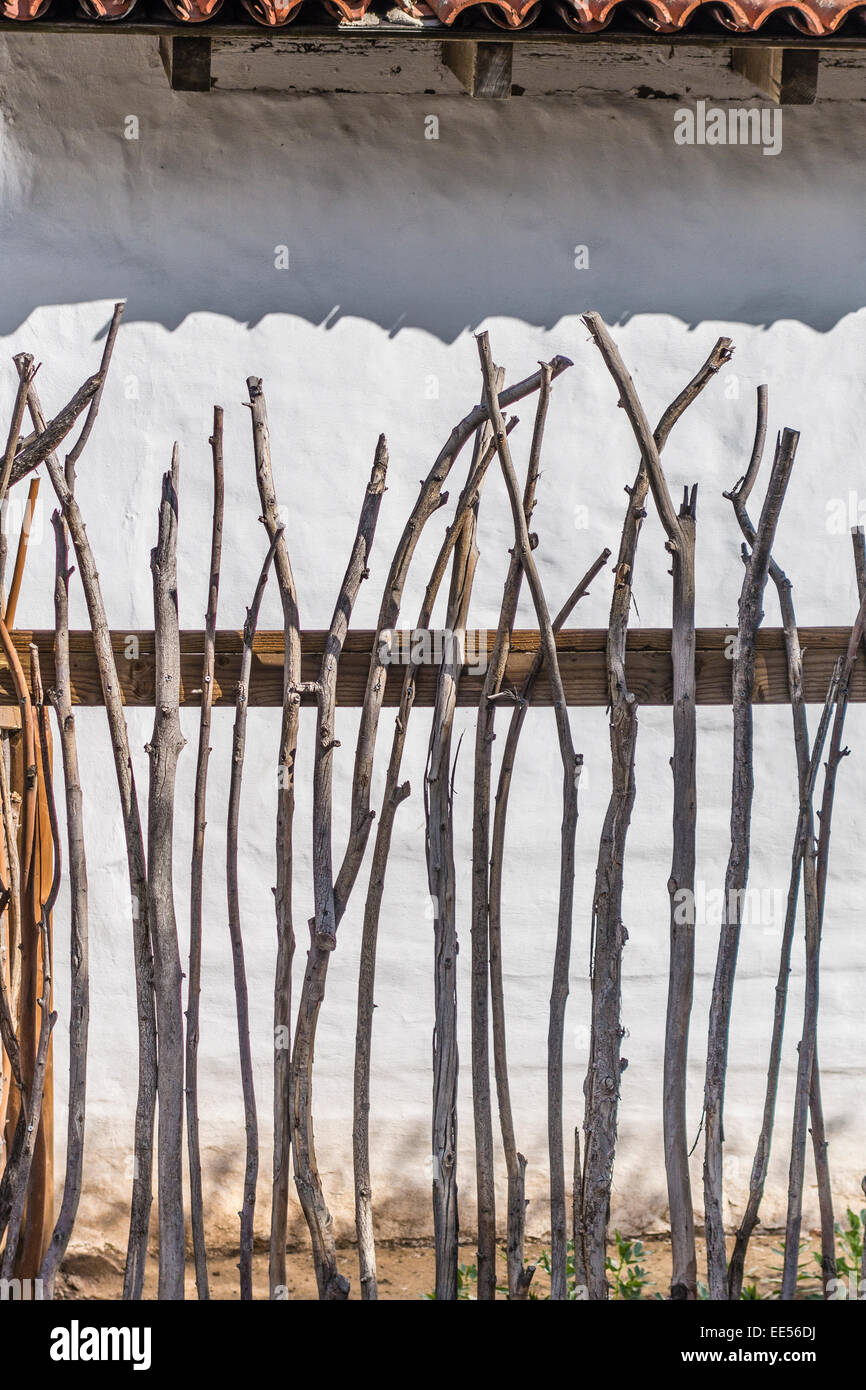 A fence constructed in the historic Spanish method using tree branches ...