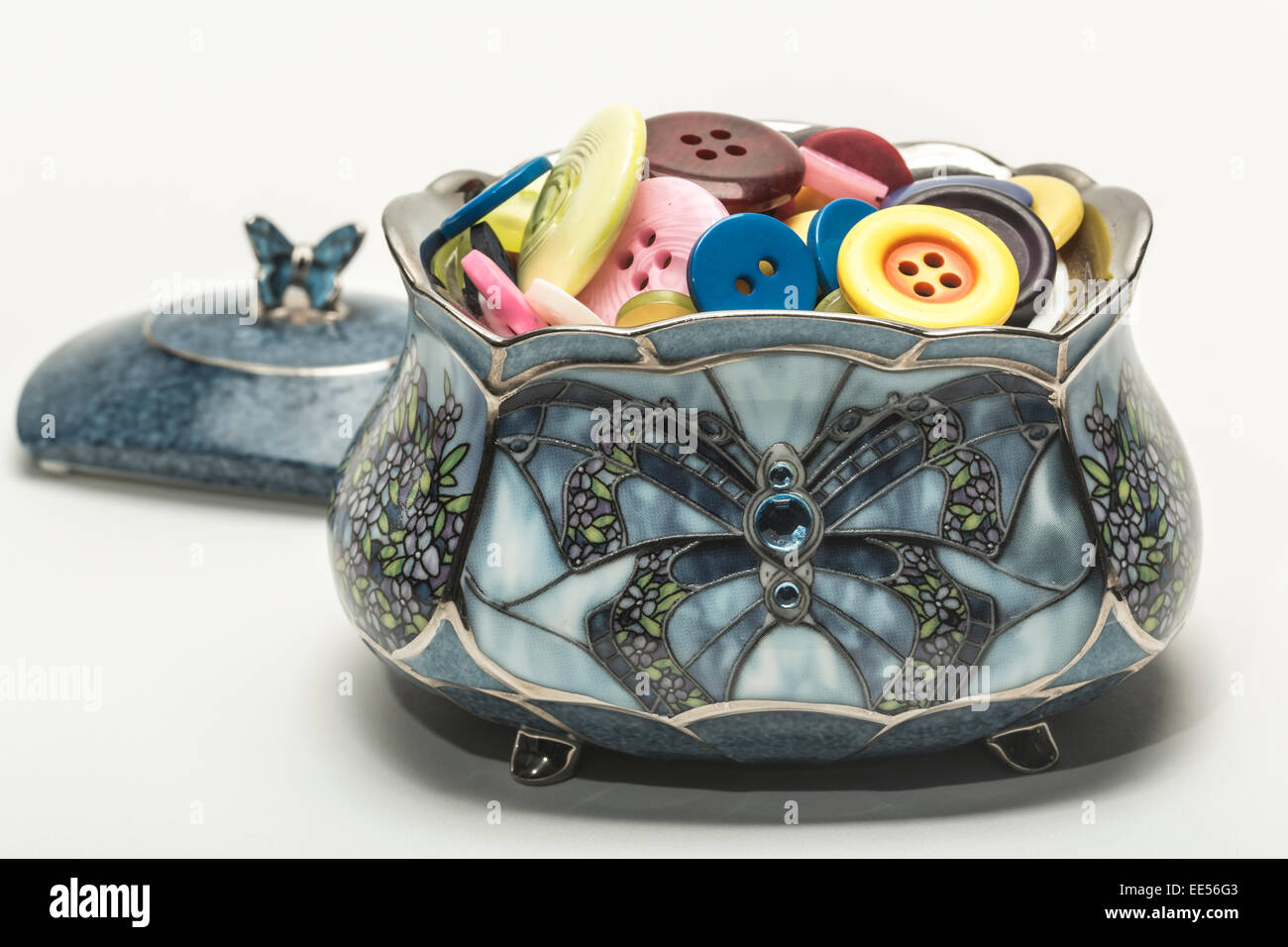 music box full of clothing buttons on white bkg Stock Photo - Alamy