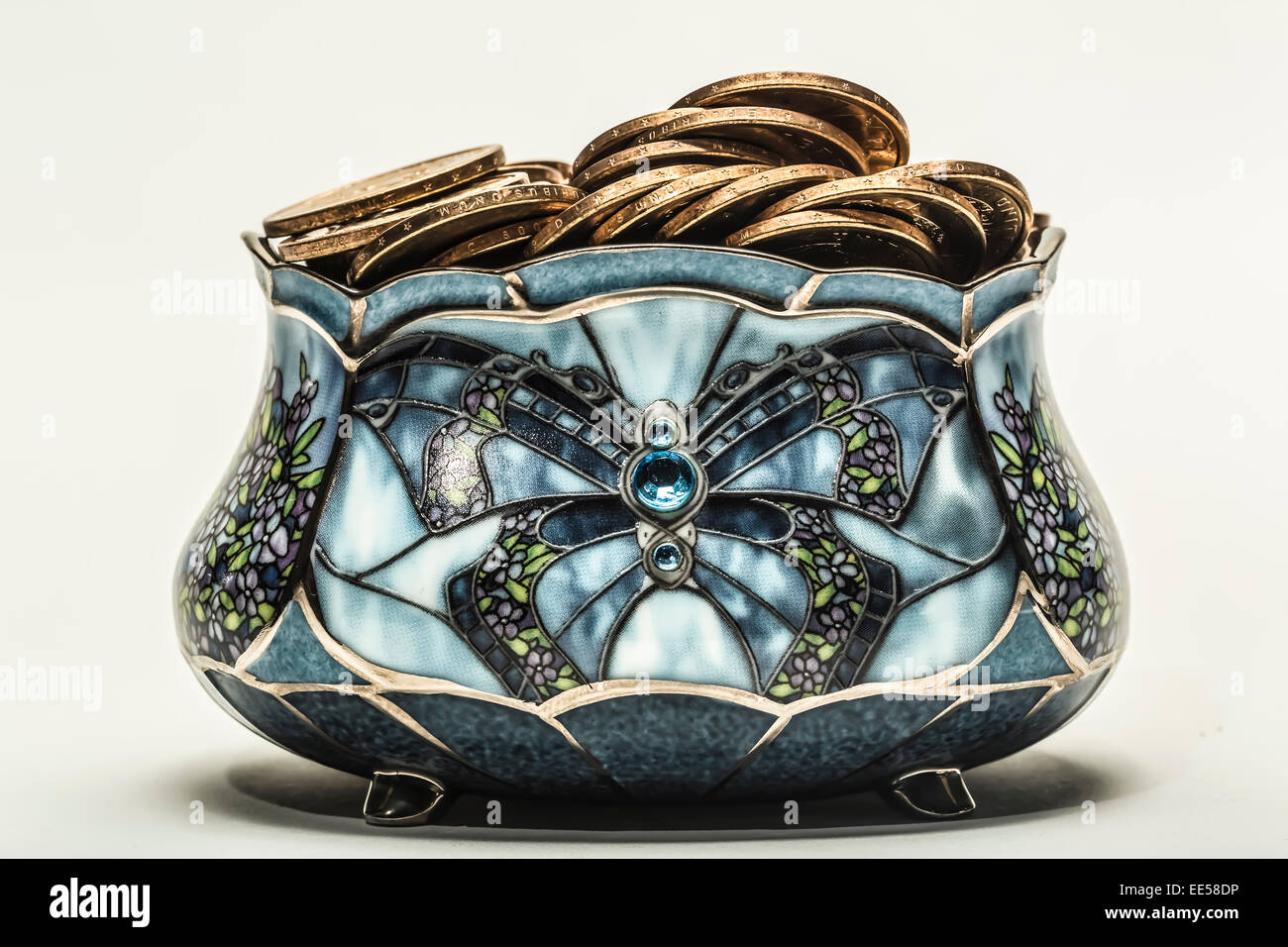 decorative glass container of clothing buttons Stock Photo - Alamy