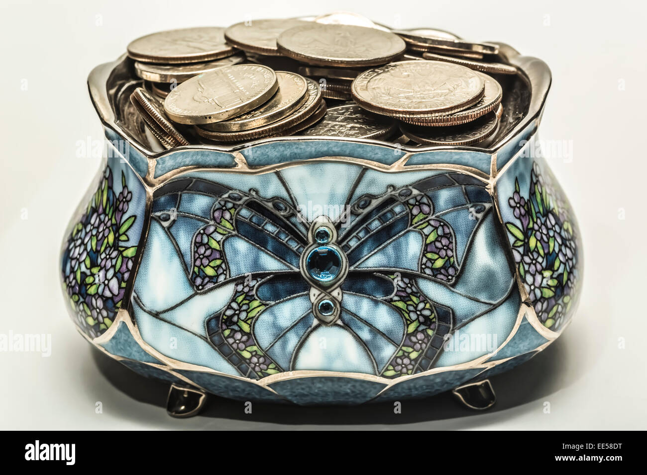 decorative glass music box of us coins Stock Photo - Alamy