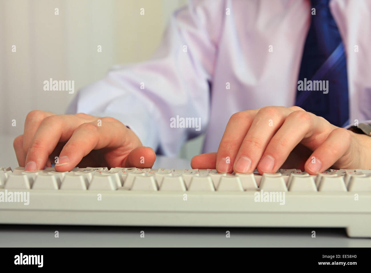 Hands on a keyboard Stock Photo - Alamy