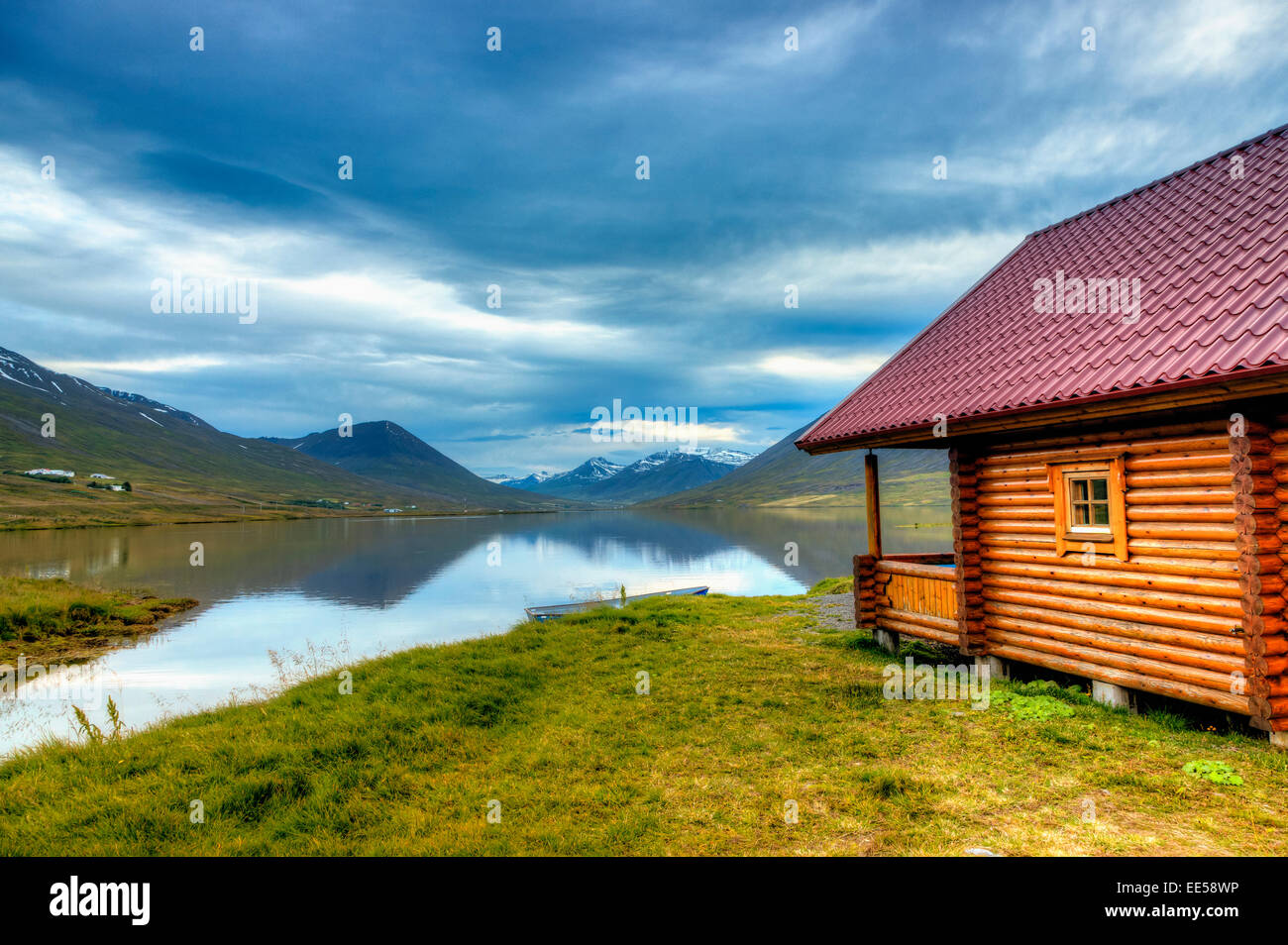 Log cabin on a scenic lake in Northern Iceland Stock Photo - Alamy