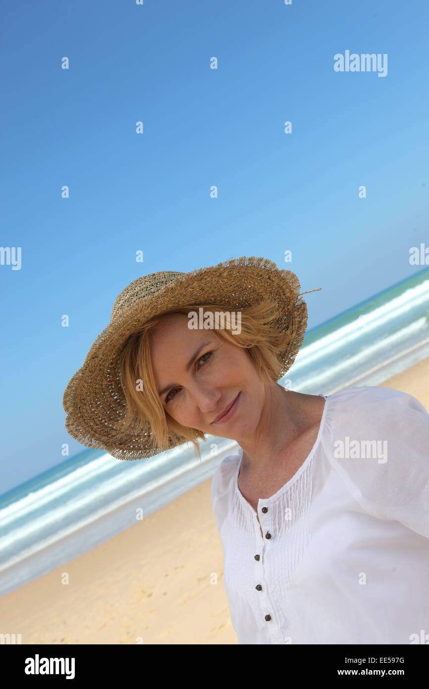 Blonde girl with overcoat Stock Photo - Alamy