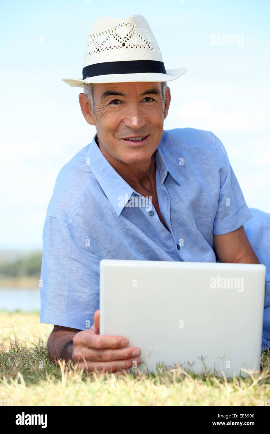 Man with computer Stock Photo - Alamy