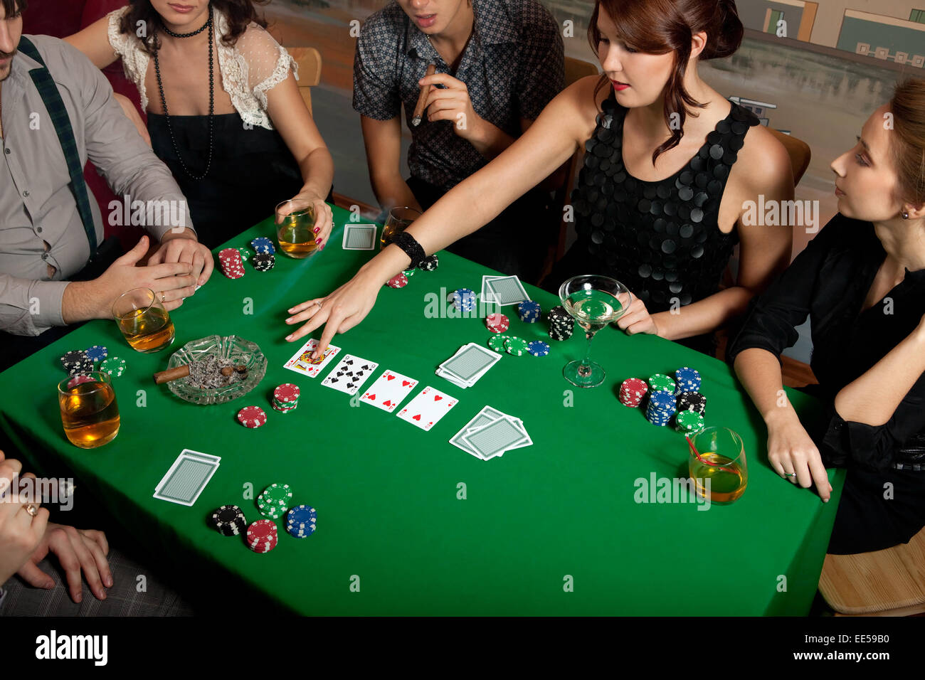 young people playing poker Stock Photo - Alamy