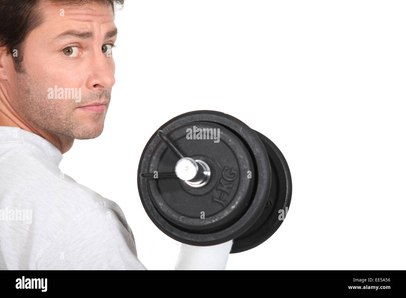portrait of a man with dumbbell Stock Photo - Alamy