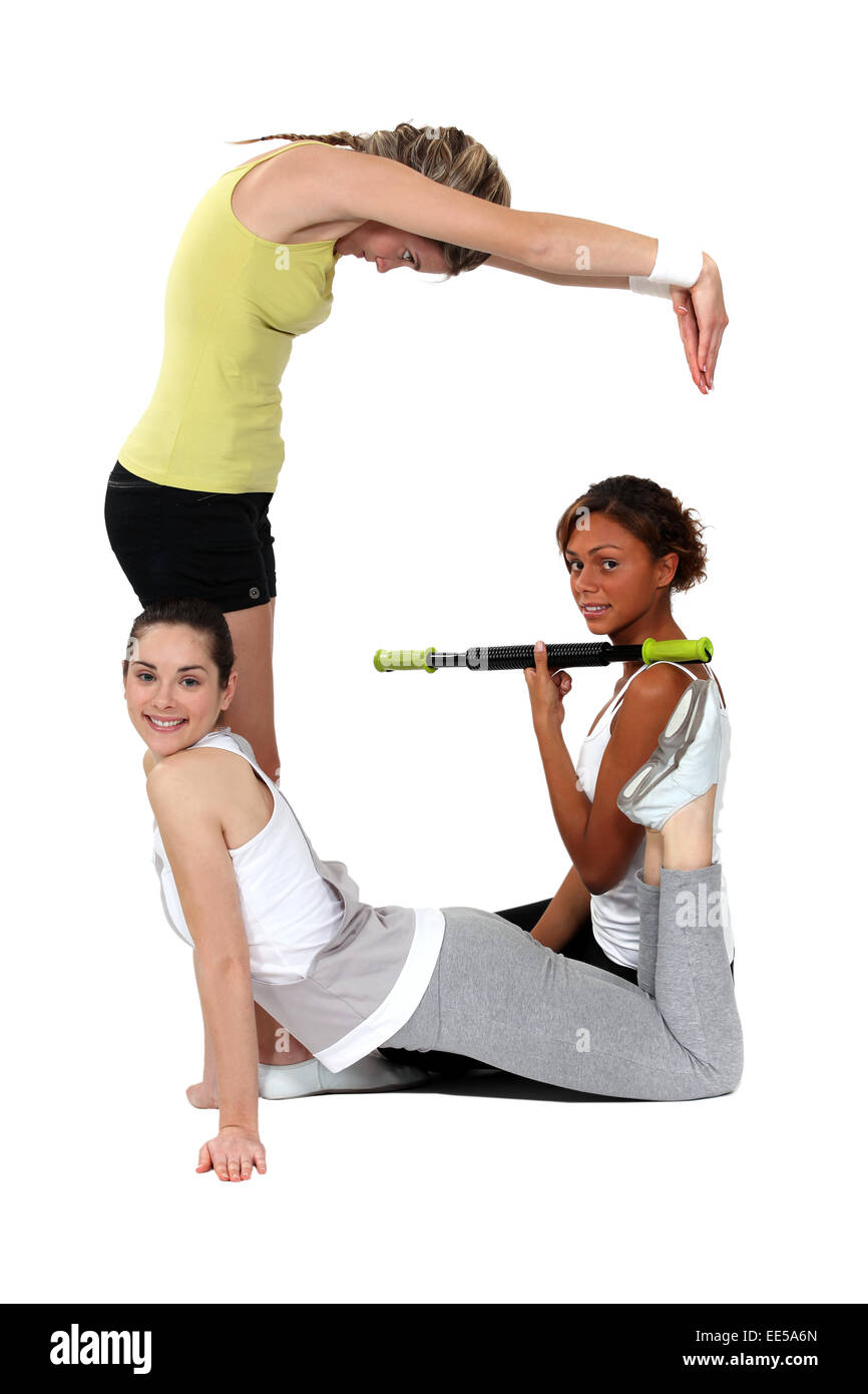female sporty trio Stock Photo - Alamy