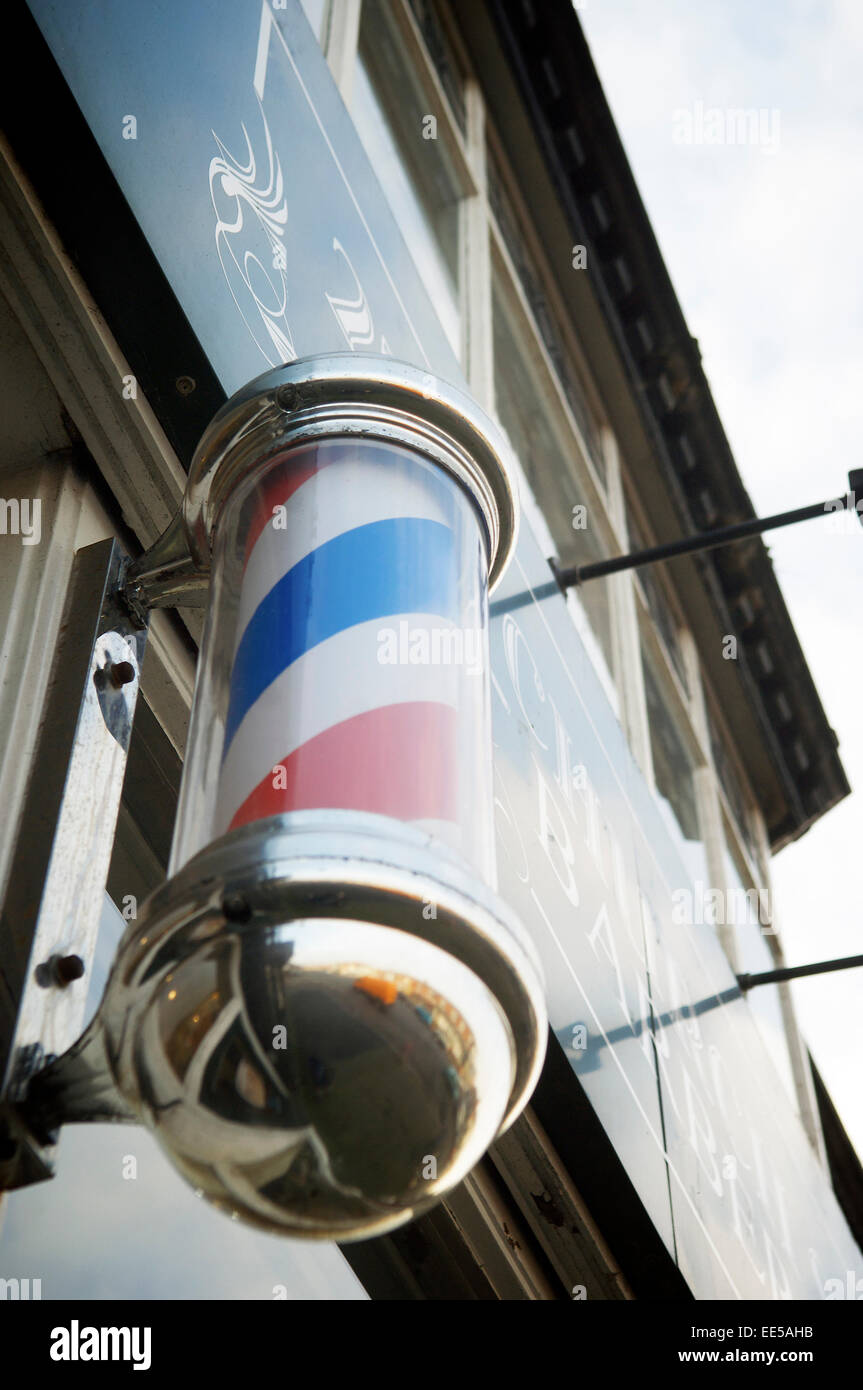 Traditional barbers shop pole Stock Photo - Alamy