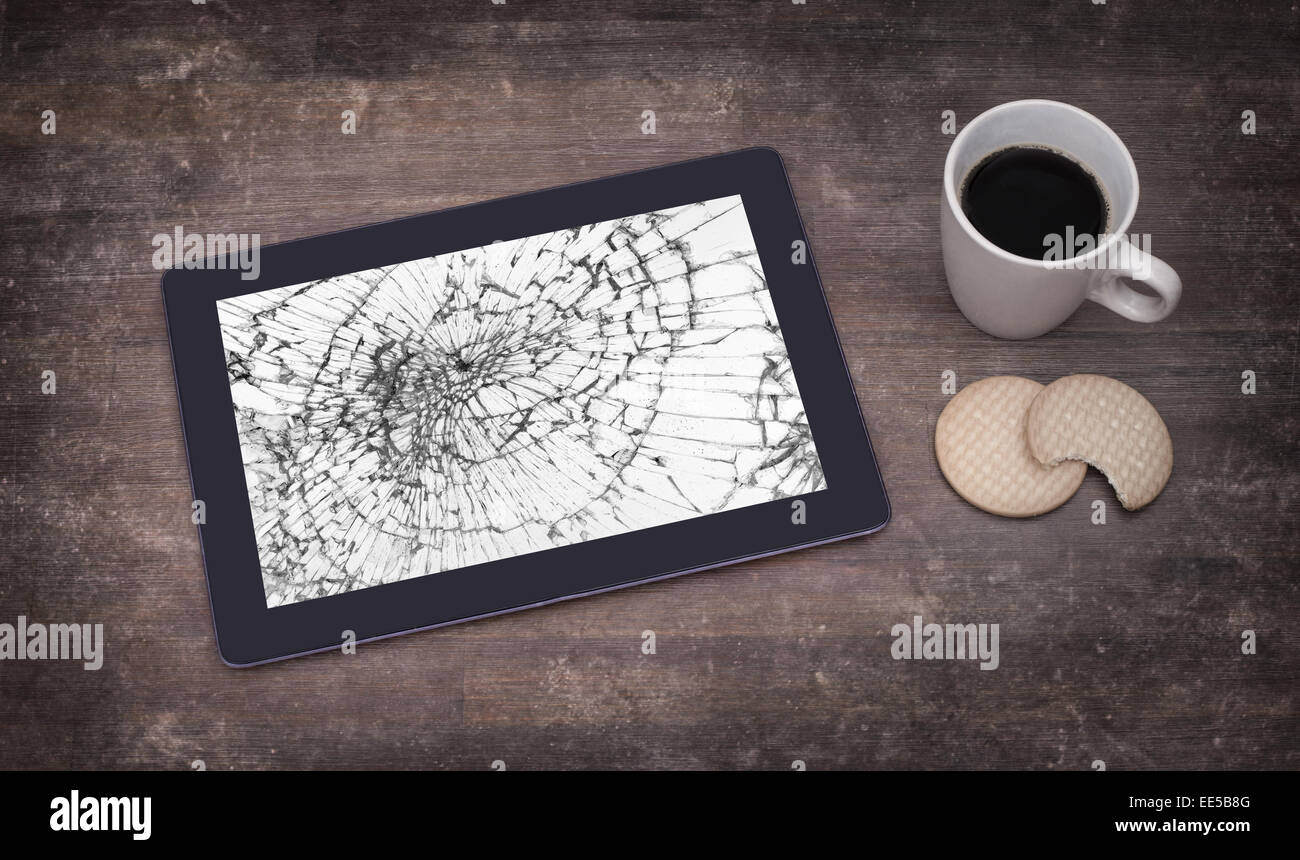 Tablet computer with broken glass, screen destroyed Stock Photo - Alamy