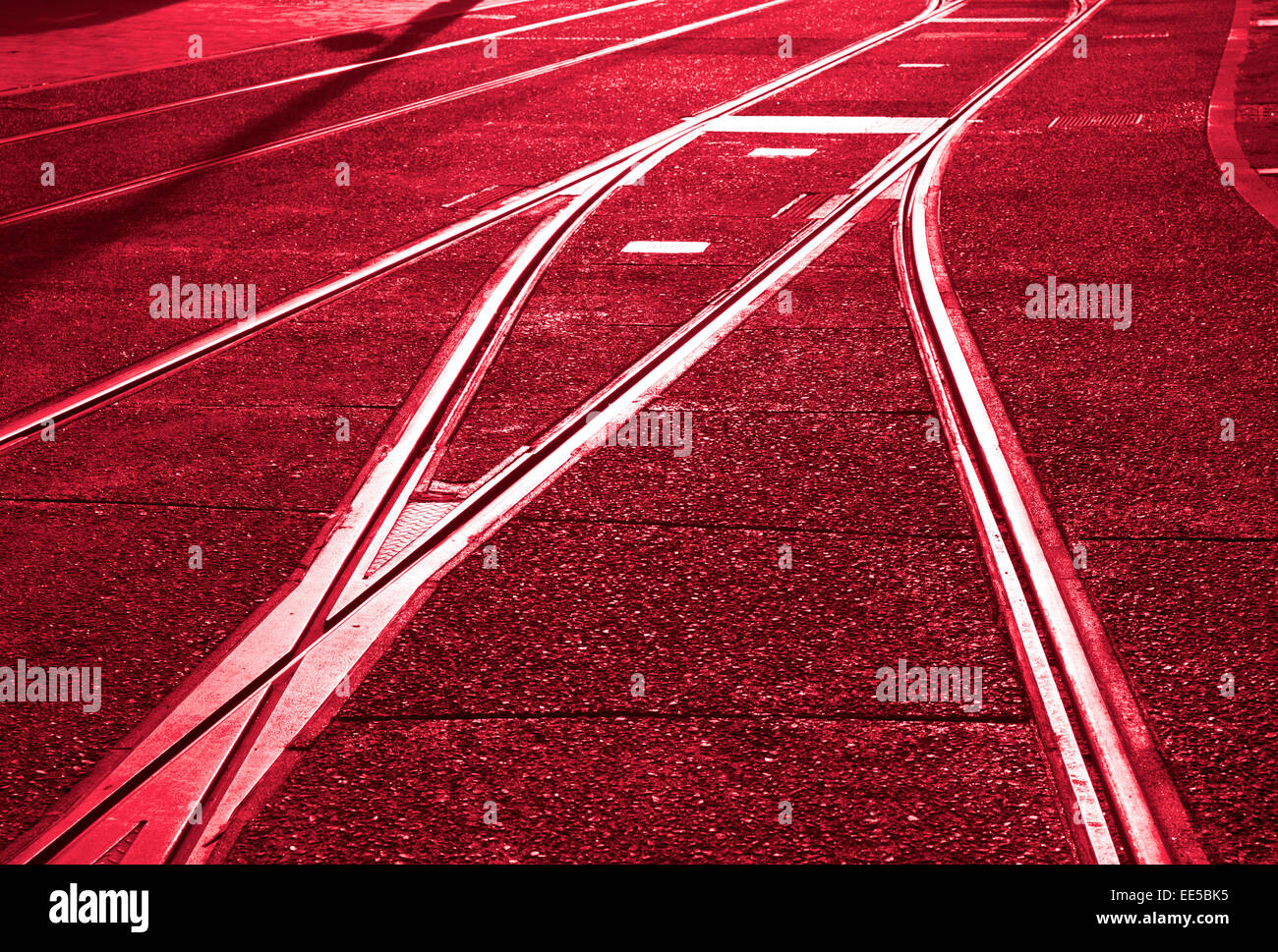 Red toned tram tracks in sunshine Stock Photo - Alamy