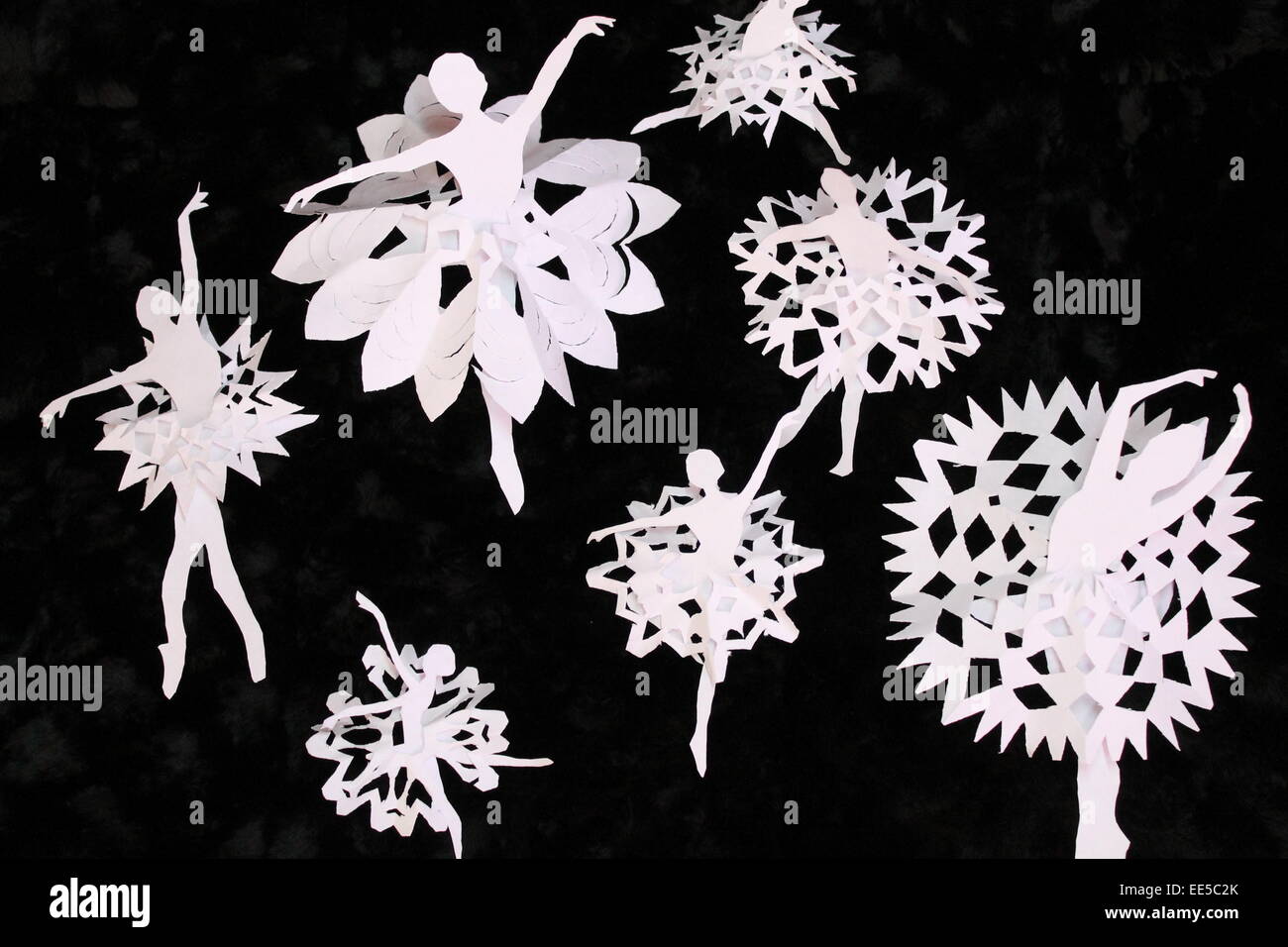 light white lace fly in dance ballerinas from paper in snowflakes ...