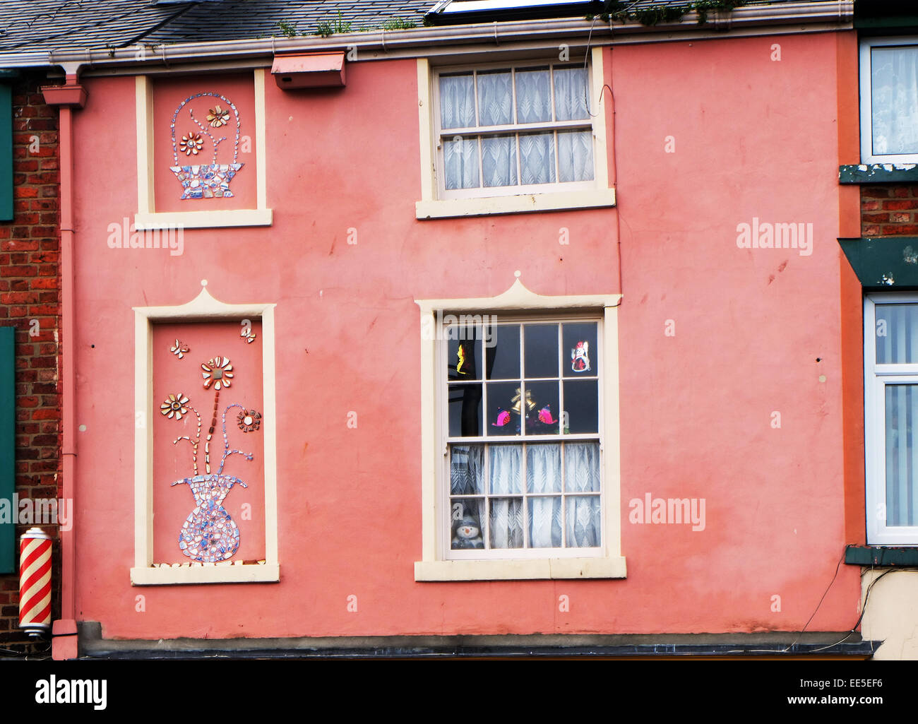 House front painted and decorated with flowers and patterns Stock Photo ...