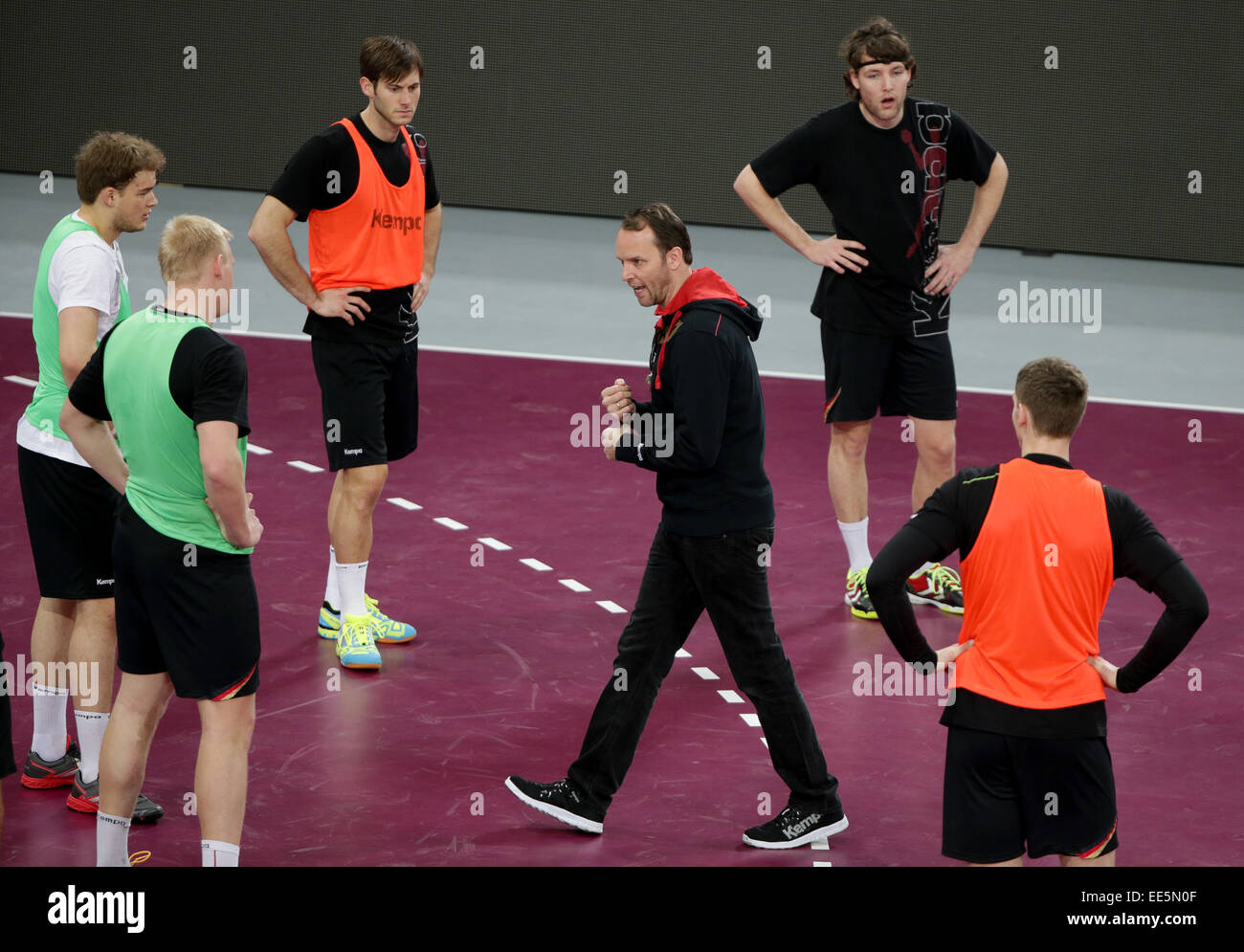 Germany's head coach Dagur Sigurdsson (C) talks to his players during ...