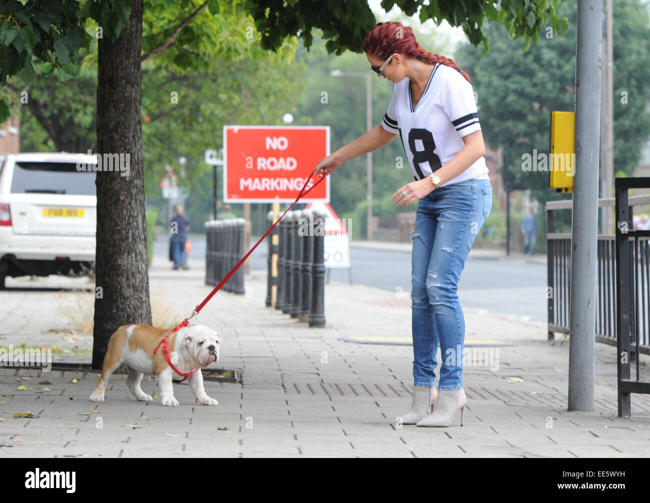 Amy Childs leaves her home in Brentwood, Essex carrying her new puppy ...