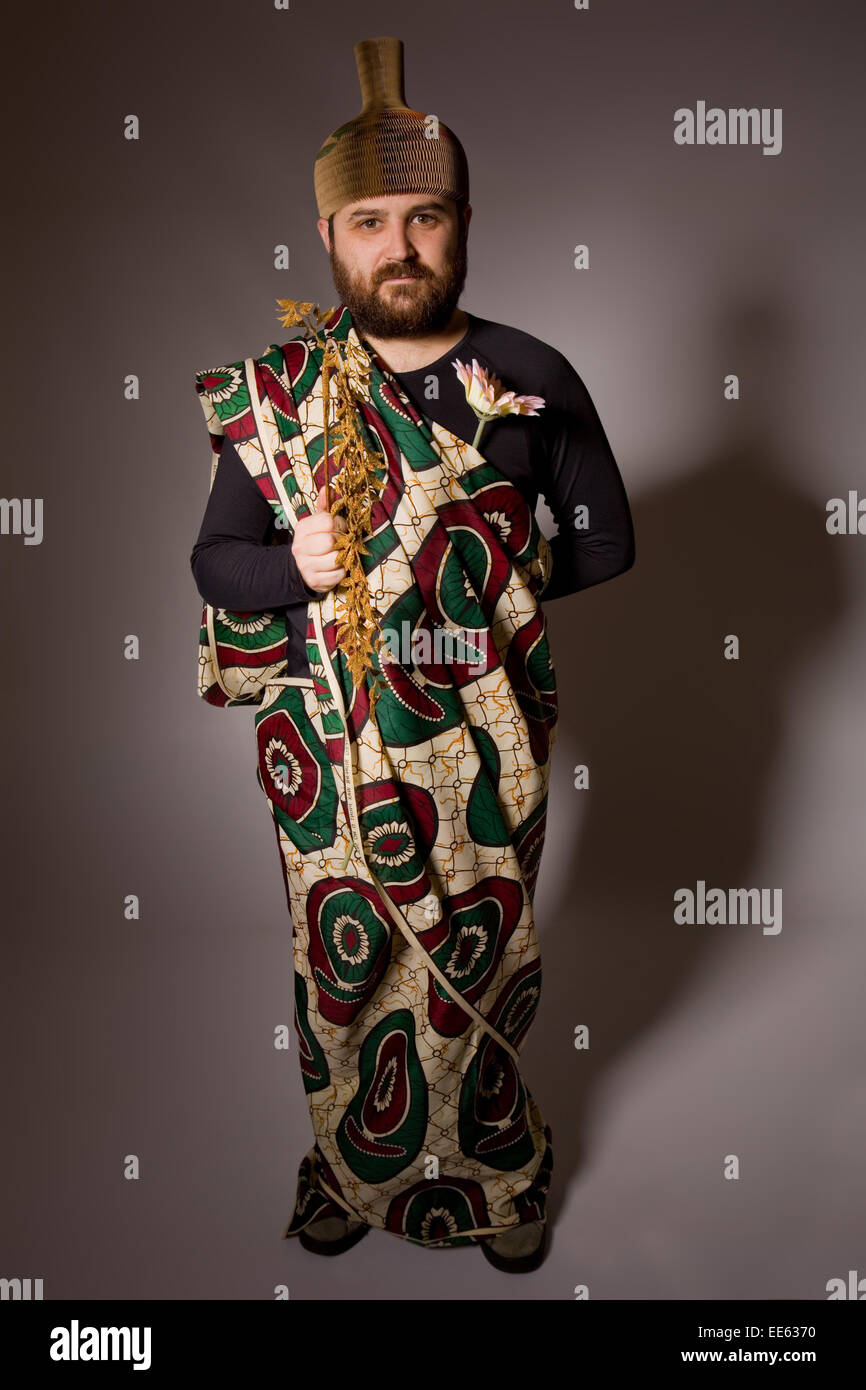 young casual silly man full length in a dark background Stock Photo - Alamy