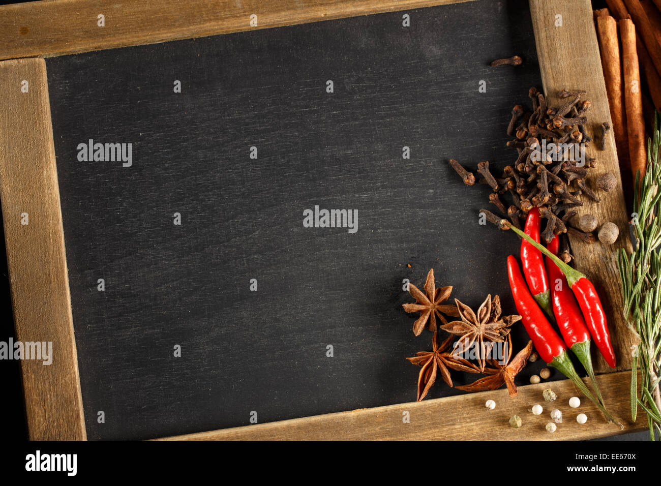 Herbs and spices with chalk board for text or recipes. Top view Stock ...