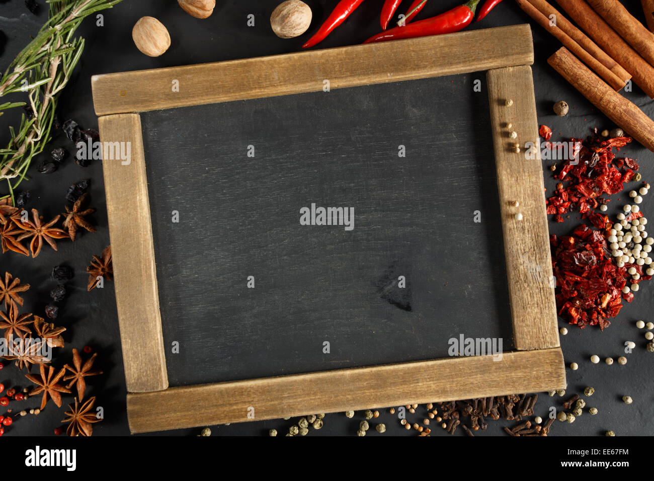 Herbs and spices with chalk board for text or recipes. Top view Stock ...