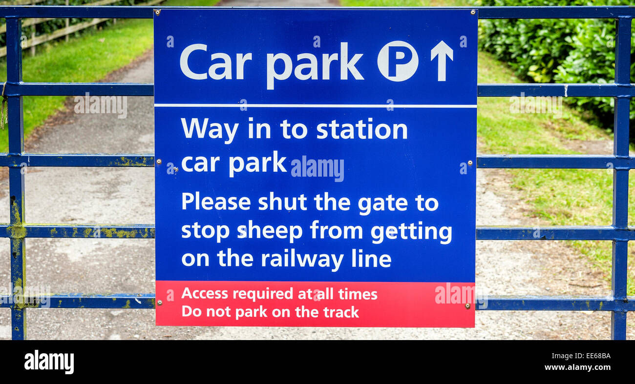 An amusing sign at the entrance to Danby railway station Stock Photo ...