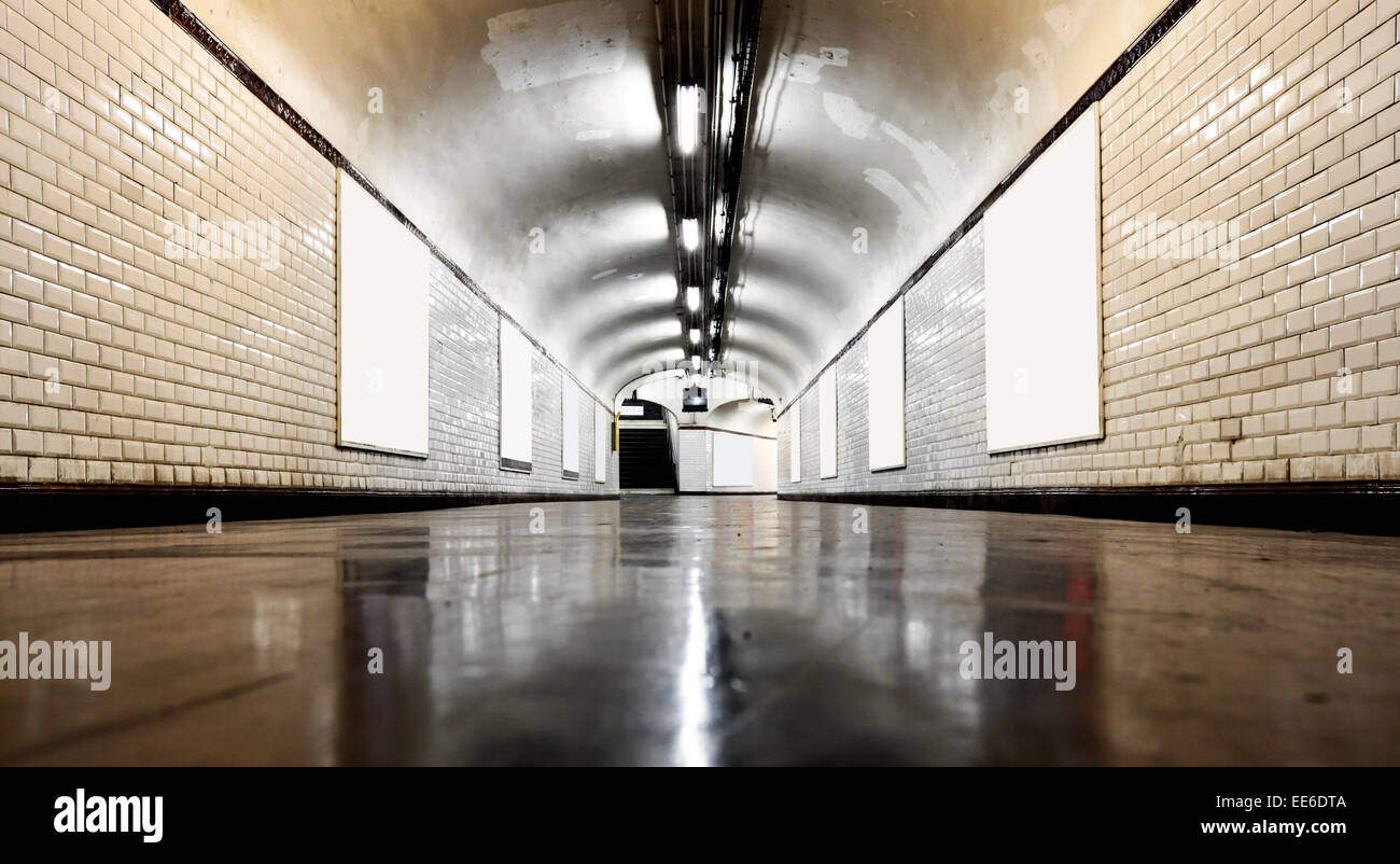 Old underground tunnel illuminated with neon Stock Photo - Alamy