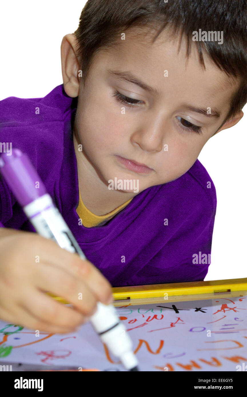 Little boy learning to write Stock Photo - Alamy
