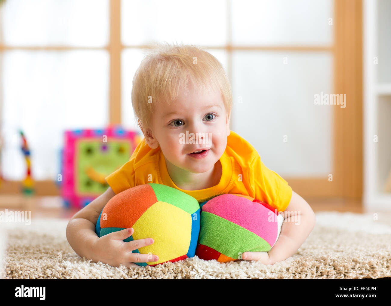 Happy boy with ball hi-res stock photography and images - Alamy