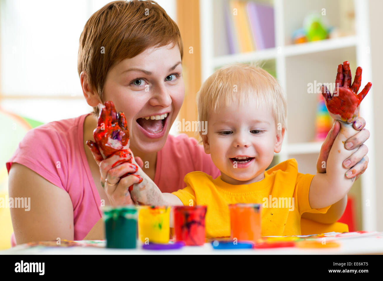 mother and child paint together at home Stock Photo - Alamy