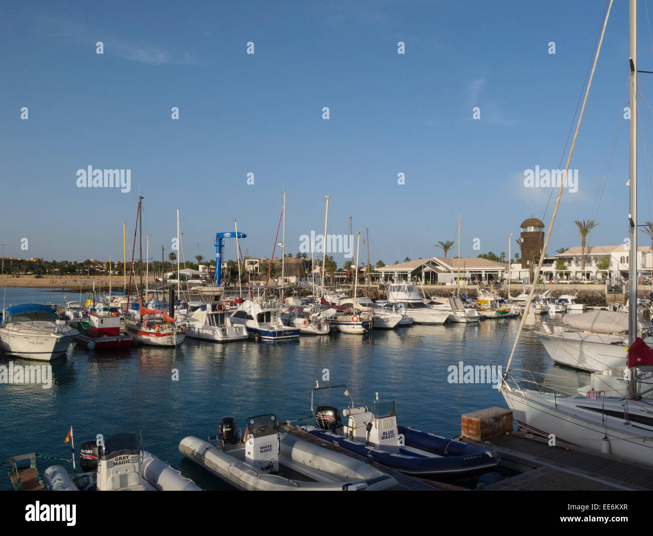 Expensive yachts and leisurecraft moored in Caleta de Fuste marina ...