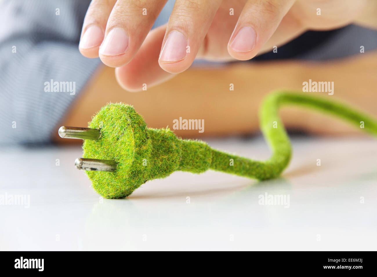 green electric plug , save energy concept Stock Photo - Alamy