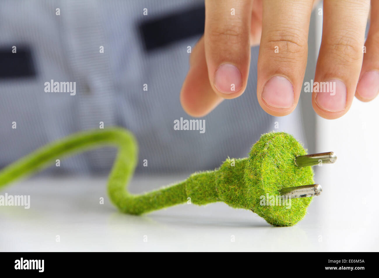 green electric plug , save energy concept Stock Photo - Alamy