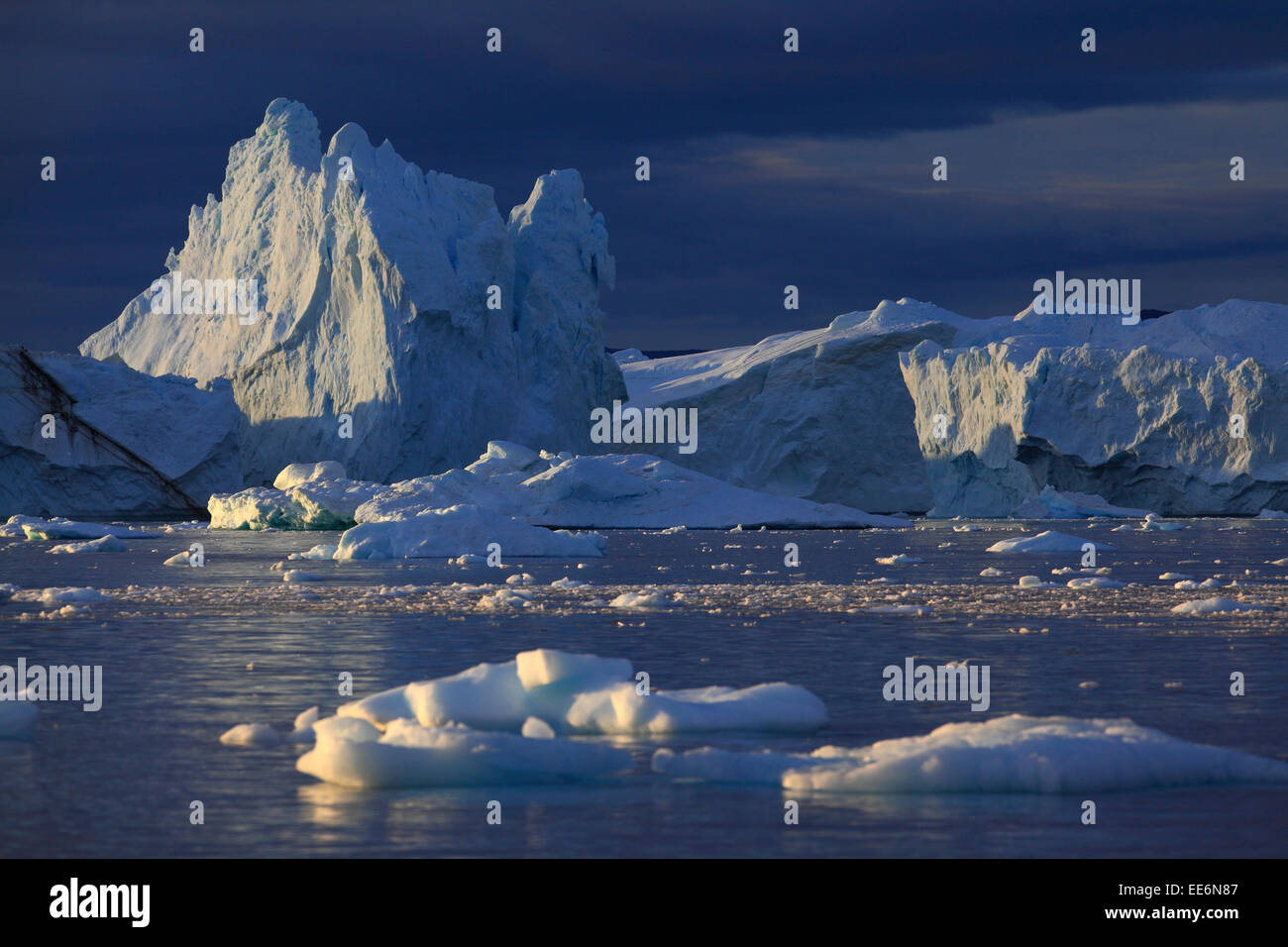 Iceberg and ice floes in Arctic Ocean, Greenland Stock Photo - Alamy
