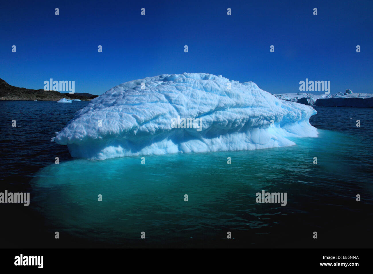 Iceberg floating on water, Arctic Ocean, Greenland Stock Photo - Alamy