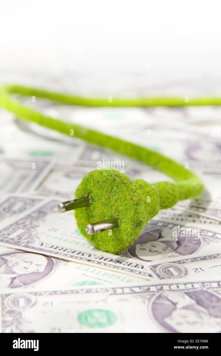 green electric plug concept Stock Photo - Alamy
