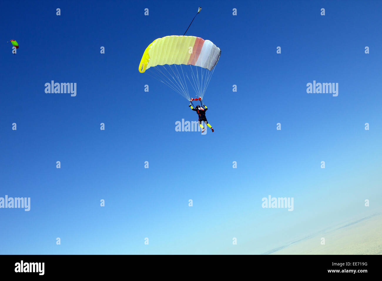 Parachuter's under canopies after flying close to each other after they ...