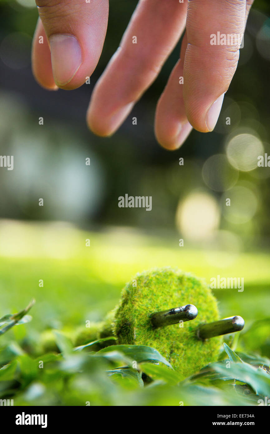 green electric plug concept Stock Photo - Alamy