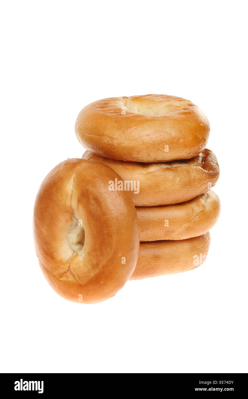 Stack of plain bagels isolated against white Stock Photo - Alamy