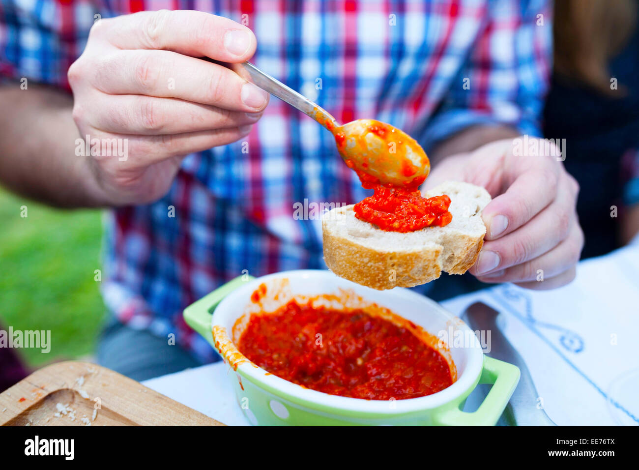 Spreading bread with jam, Munich, Bavaria, Germany Stock Photo - Alamy
