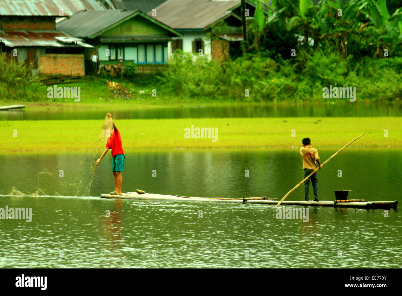 boys on the raft Stock Photo - Alamy