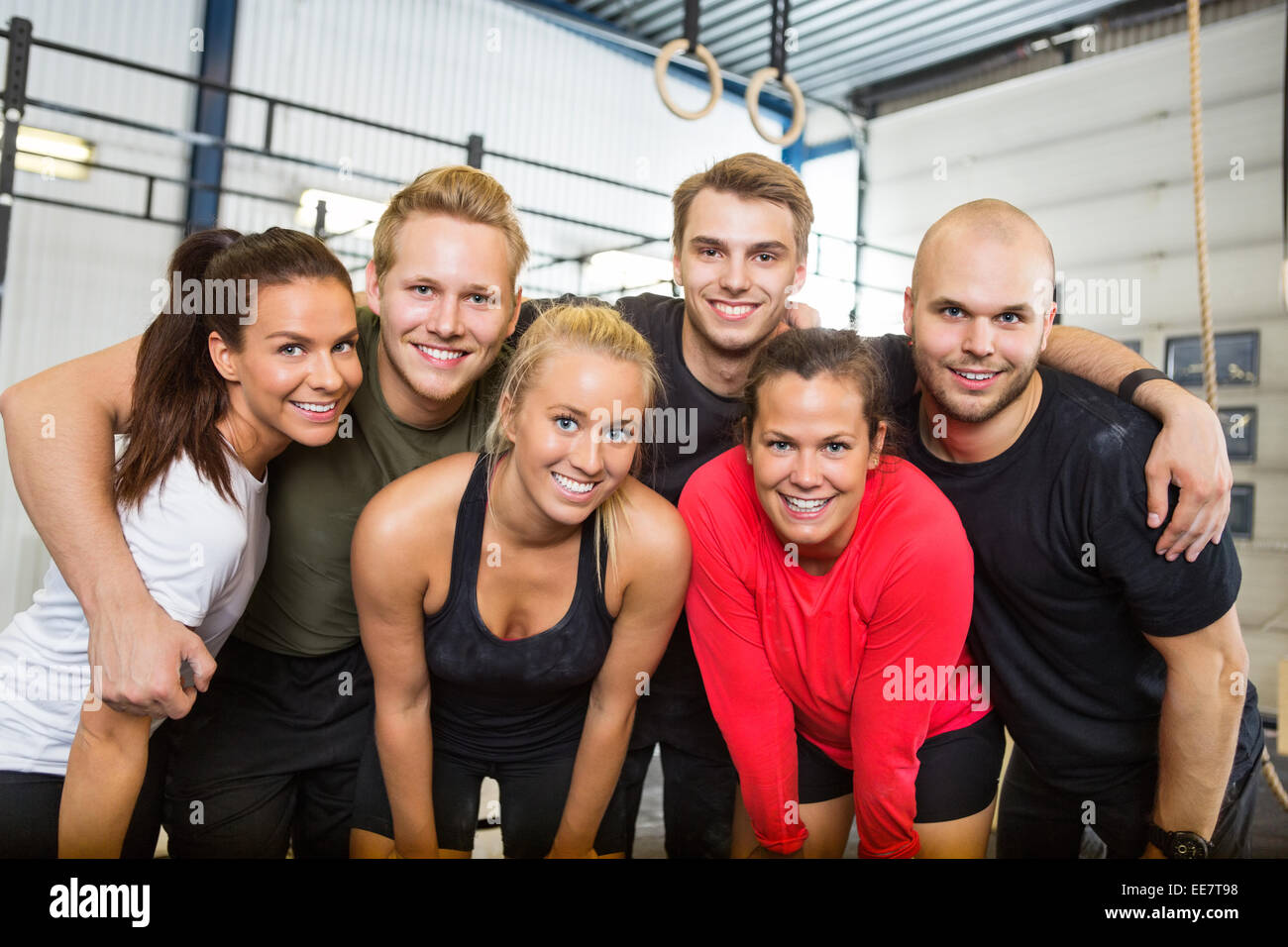 Happy People Standing Together At Cross Training Box Stock Photo - Alamy