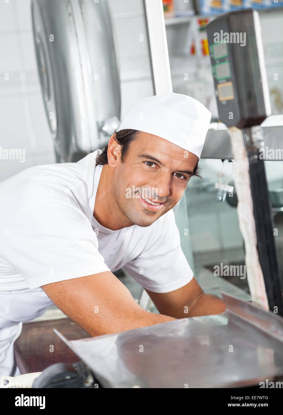 Confident Butcher Working In Butchery Stock Photo - Alamy
