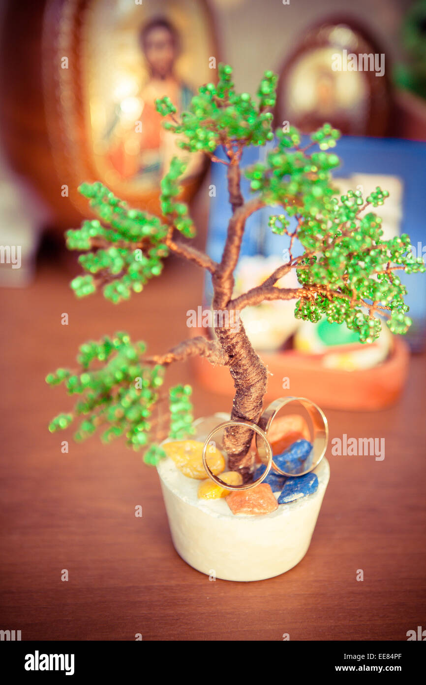 Beautiful wedding rings on handmade tree Stock Photo - Alamy