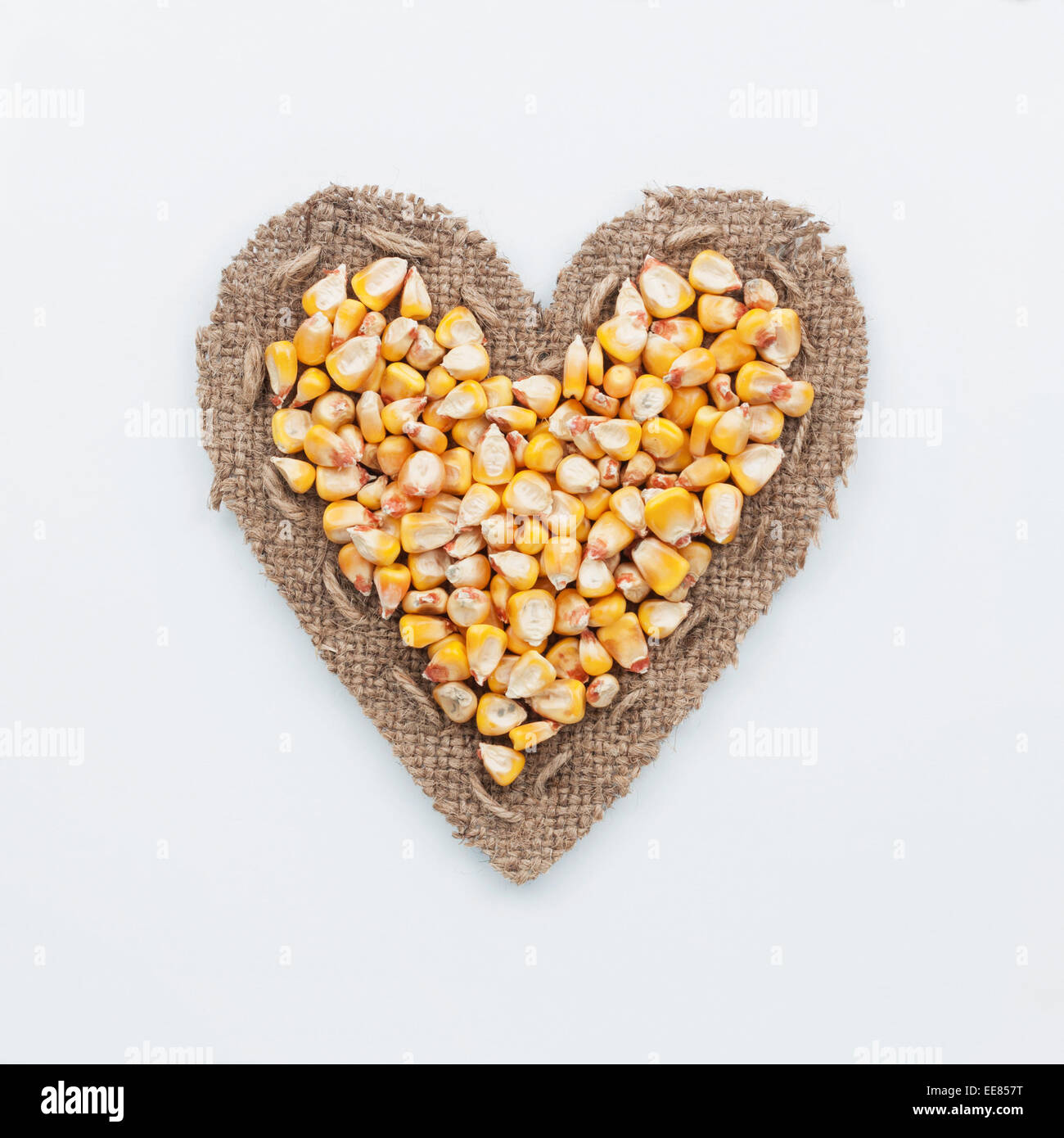 Frame in the shape of heart with corn, on a white background Stock ...