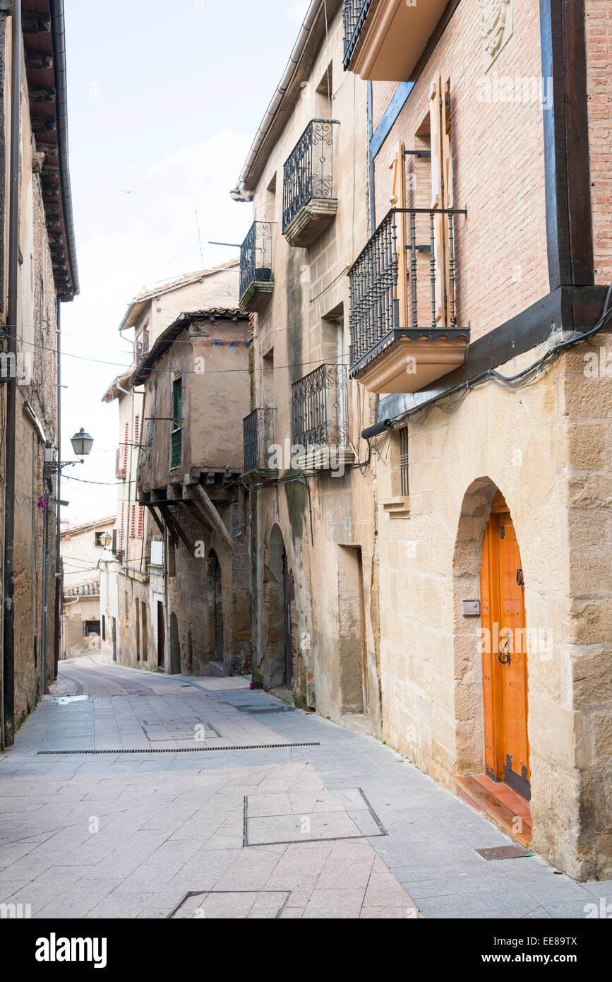 A narrow street and old buildings in the town of Haro, the capital of ...