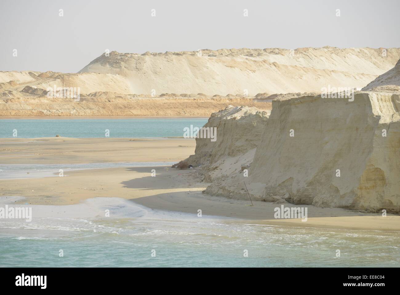 Earthmoving and dredging machines in action digging the new Suez Canal ...