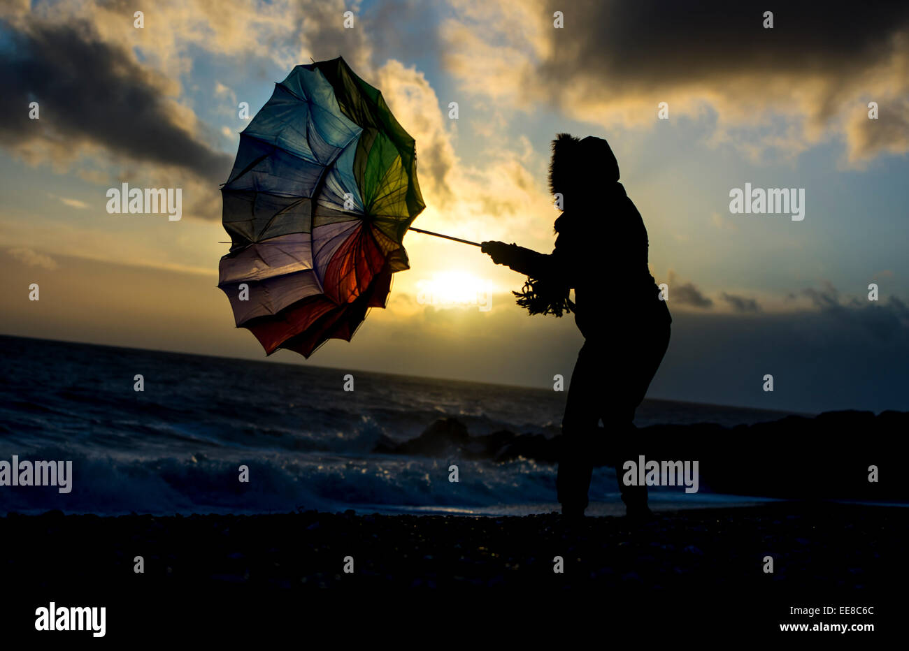 Strong wind umbrella hi-res stock photography and images - Alamy