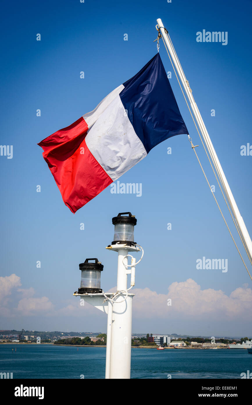 French flag flying on a ferry leaving Portsmouth, Hampshire, UK Stock ...