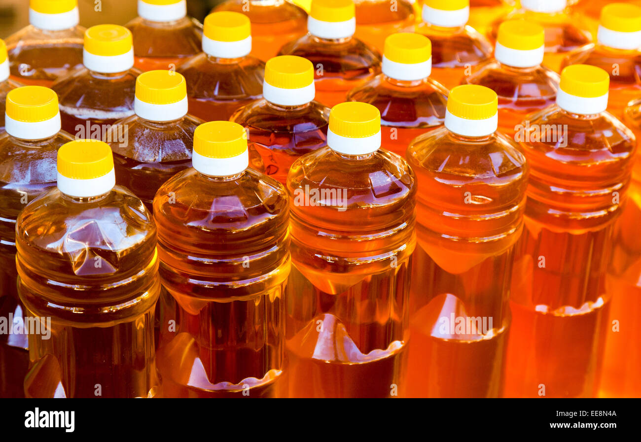 Bottles of sunflower oil close up Stock Photo - Alamy