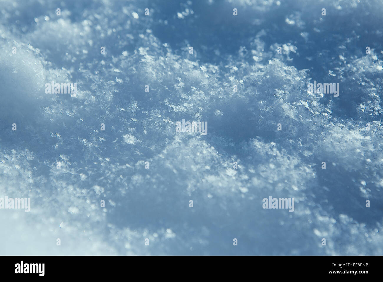 Macro photo of bright snow background Stock Photo - Alamy