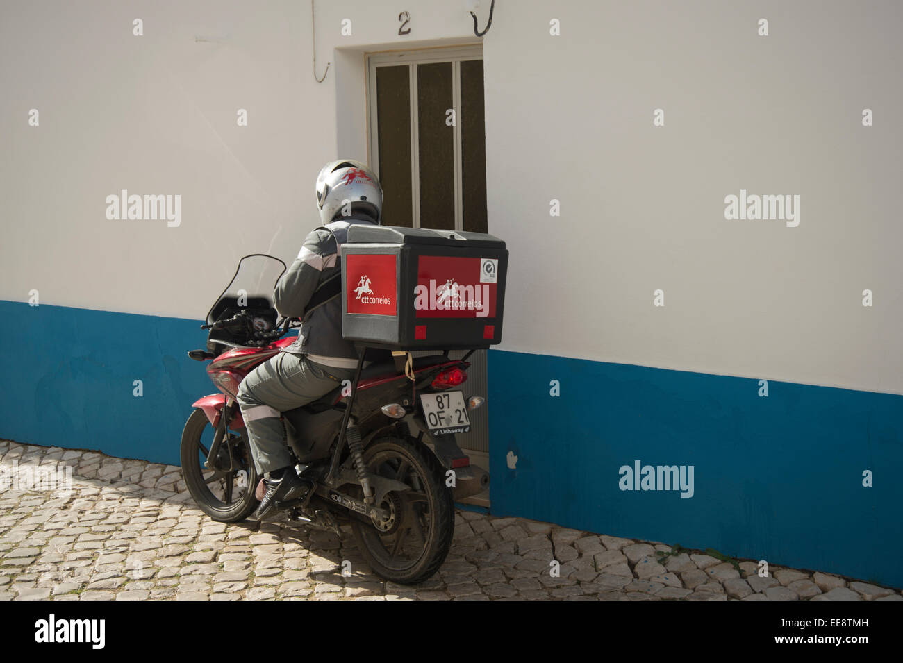 Postman delivering mail hi-res stock photography and images - Alamy