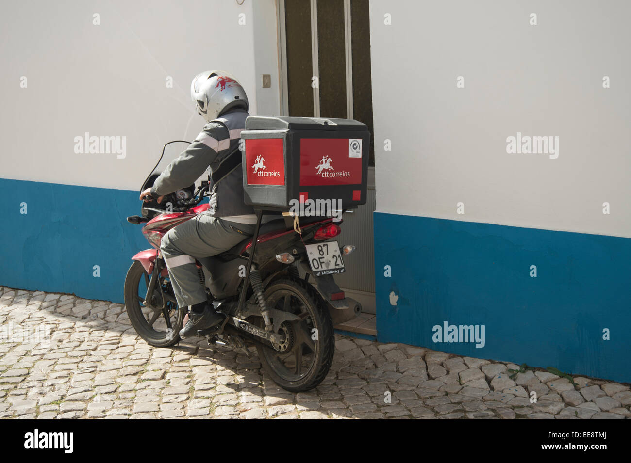 Postman delivering mail hi-res stock photography and images - Alamy