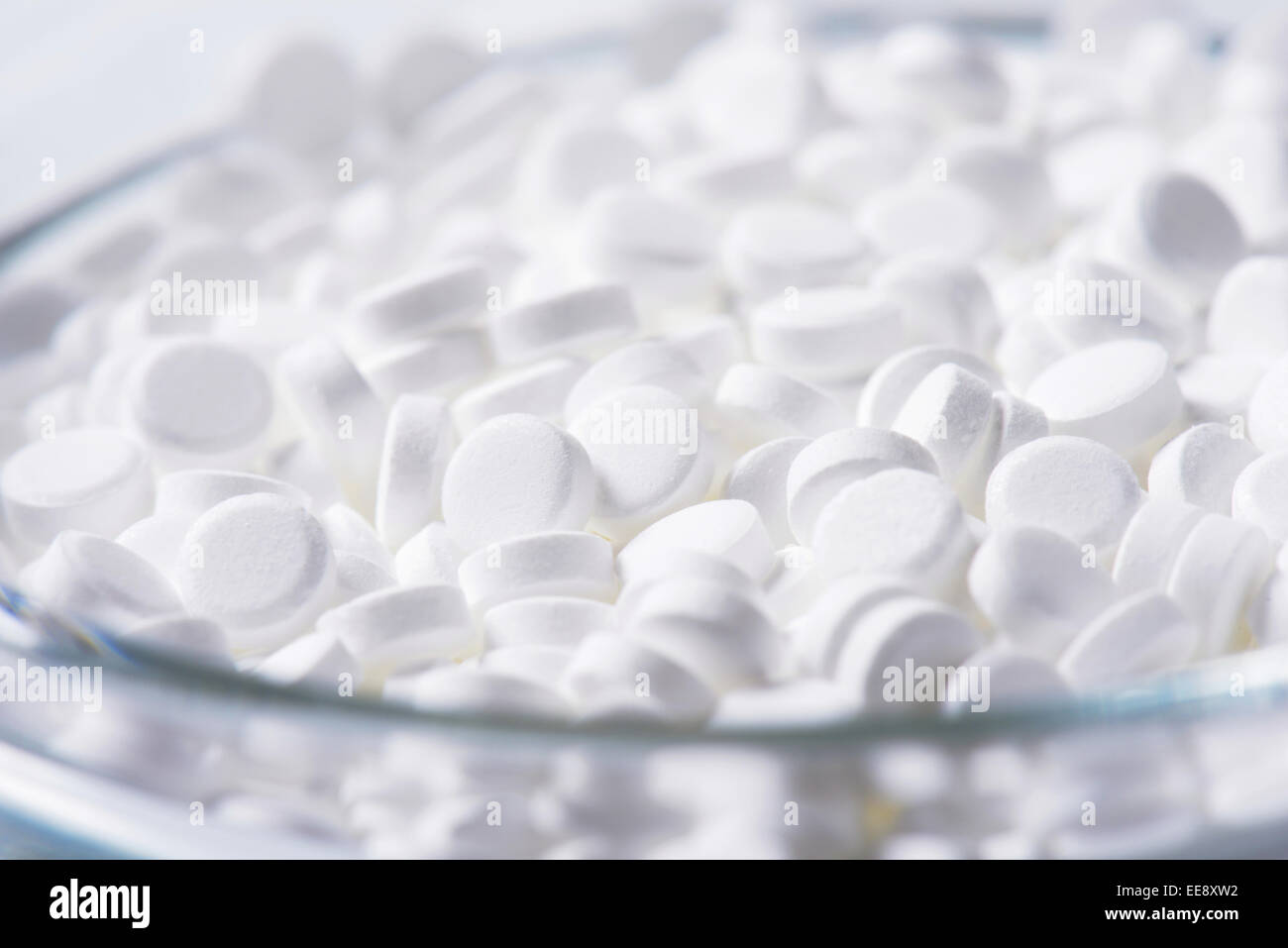 Artificial sweetener tablets in glass hi-res stock photography and ...